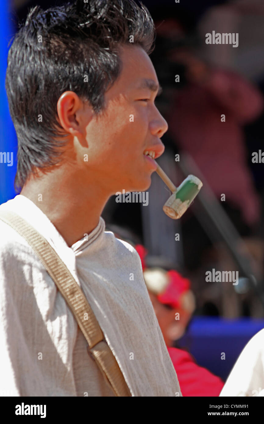 Nyishi tribes, man with smoking pipe at Namdapha Eco Cultural Festival ...