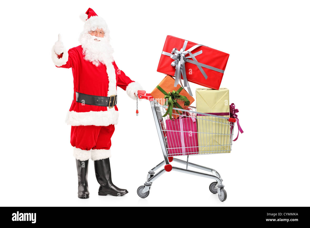 Santa Claus holding a shopping cart full of gifts and giving a thumb up ...