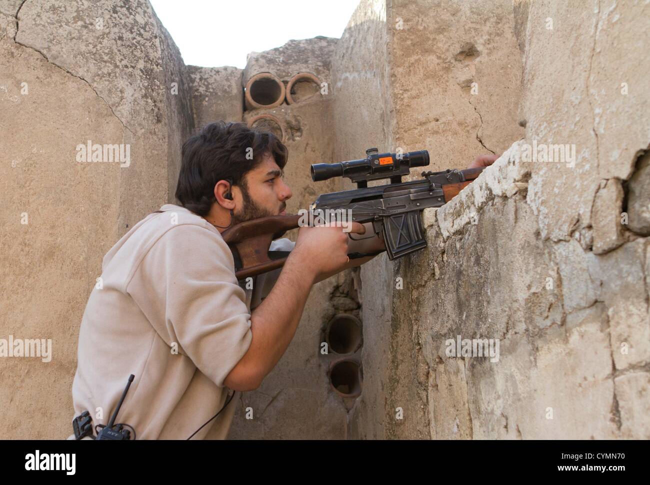 November 6, 2012 - Aleppo, Syria: A Free Syrian Army sniper shoots at ...