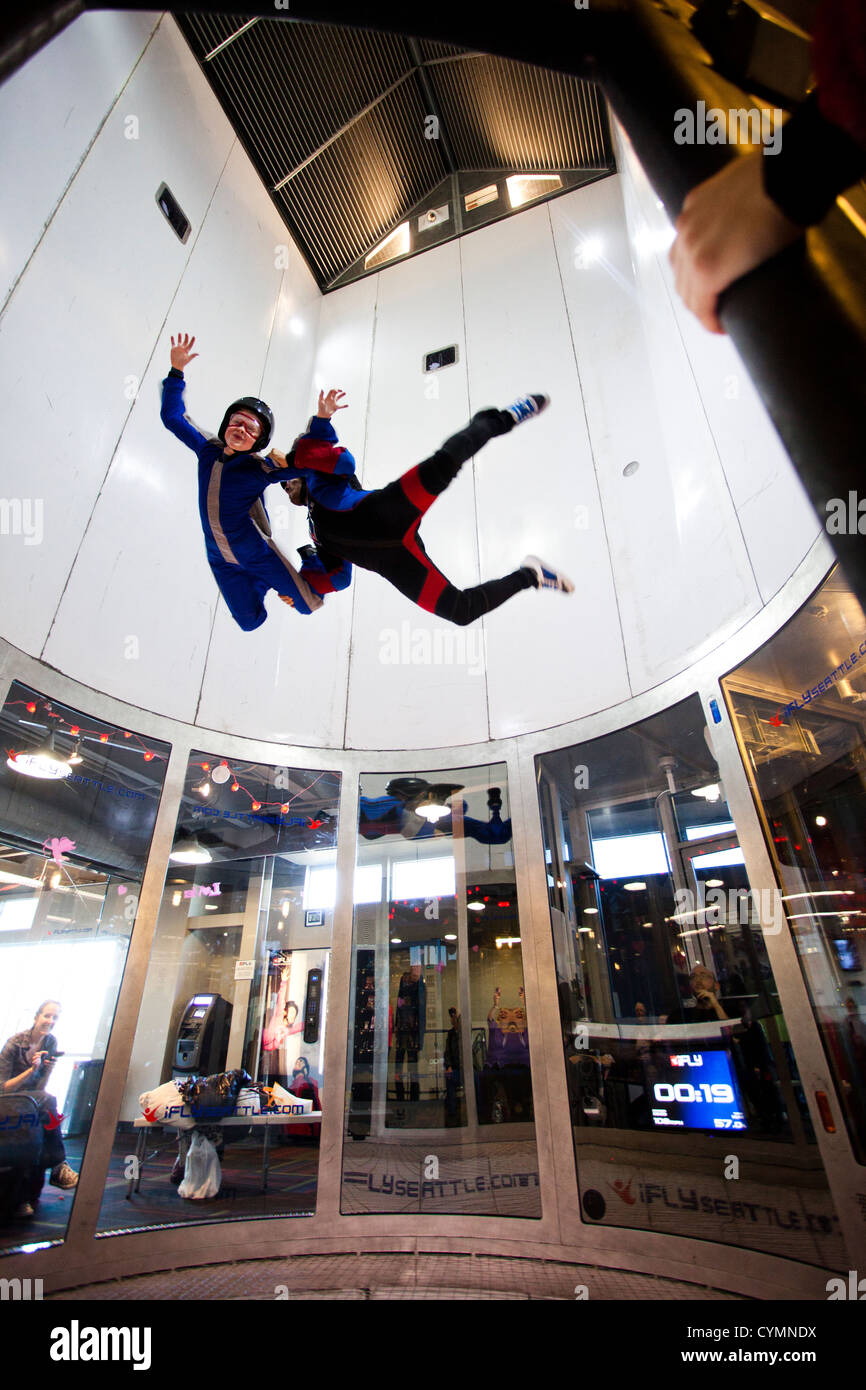 A young boy enjoys the indoor sky diving at a facility in Seattle Stock ...
