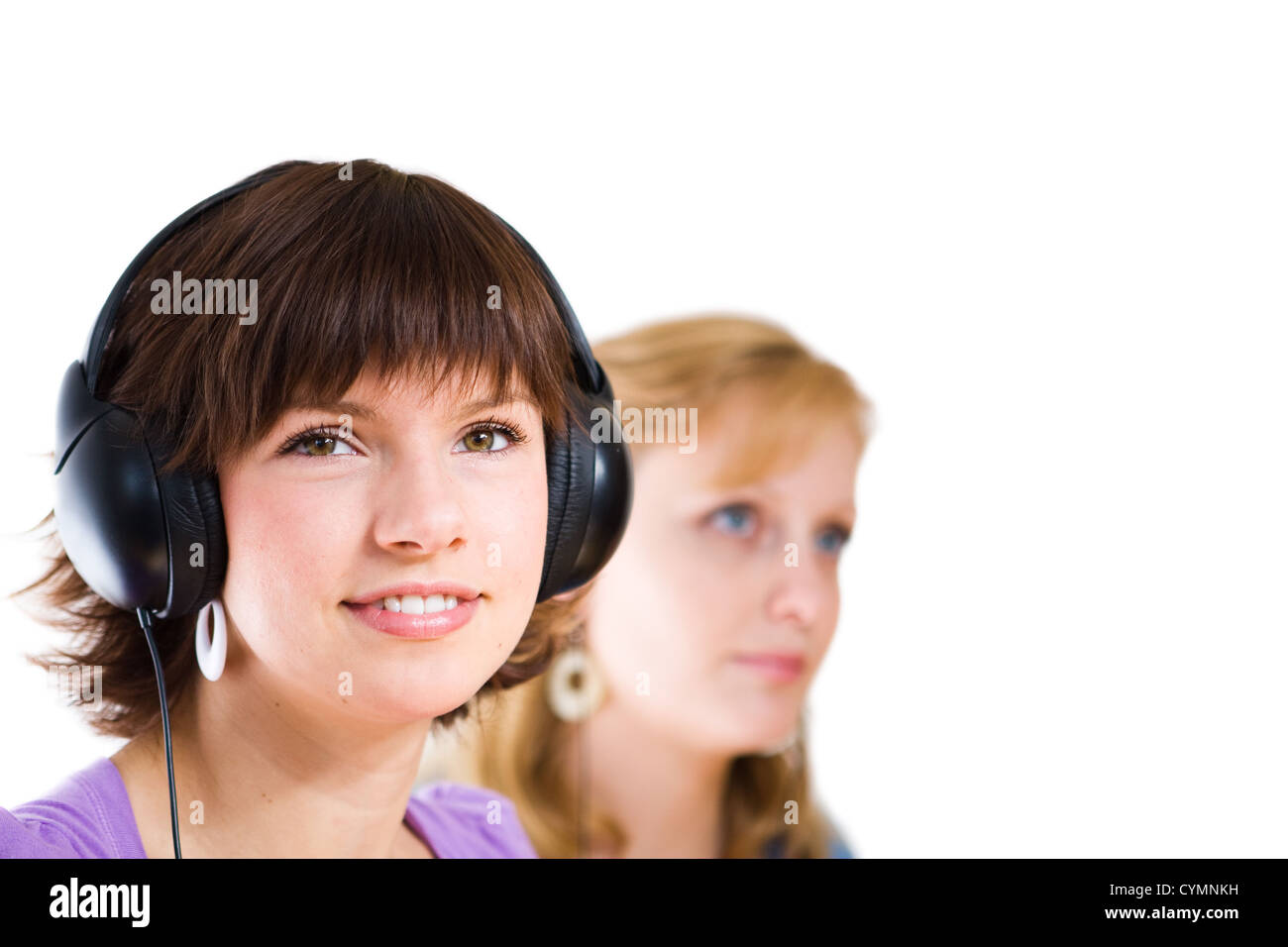 Girls listening to music Stock Photo - Alamy