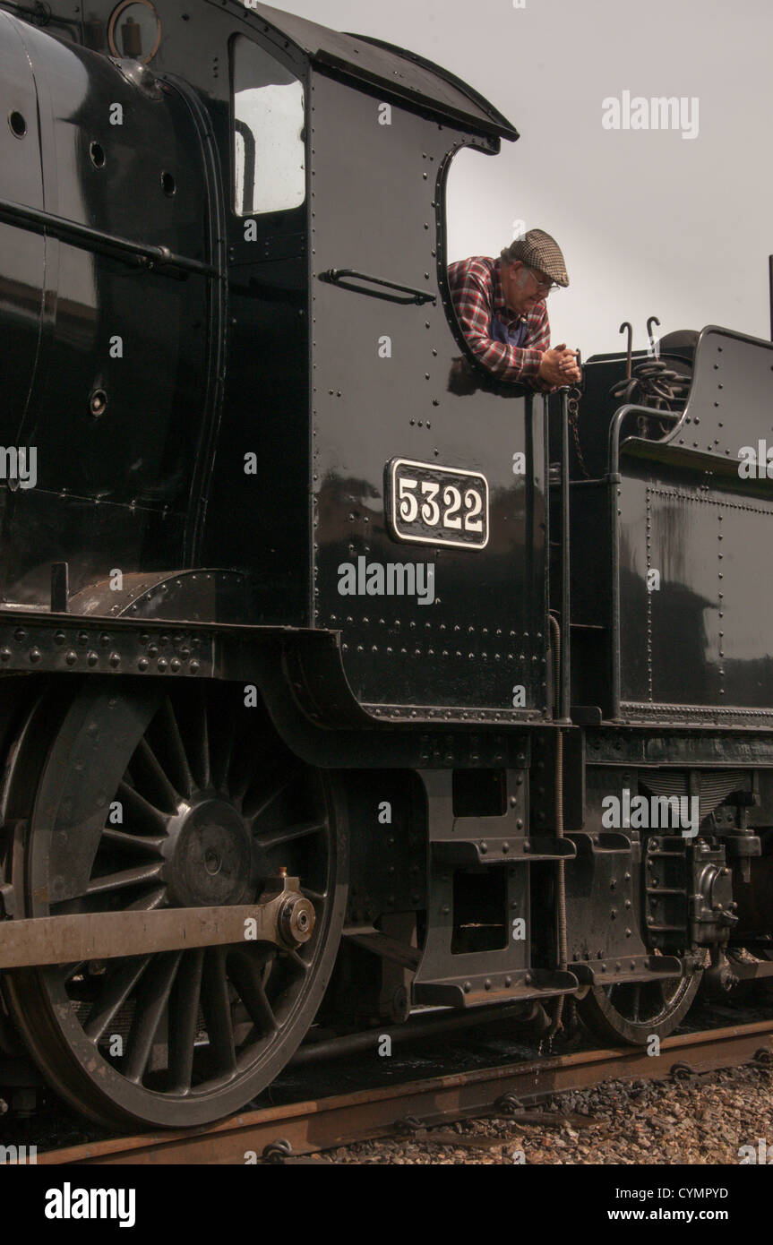 engine driver in cab of loco Stock Photo - Alamy
