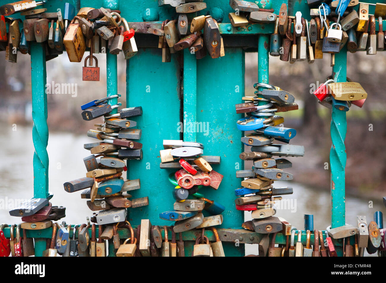 Locks affixed to a bridge in Wroclaw, Poland by lovers to symbolize ...