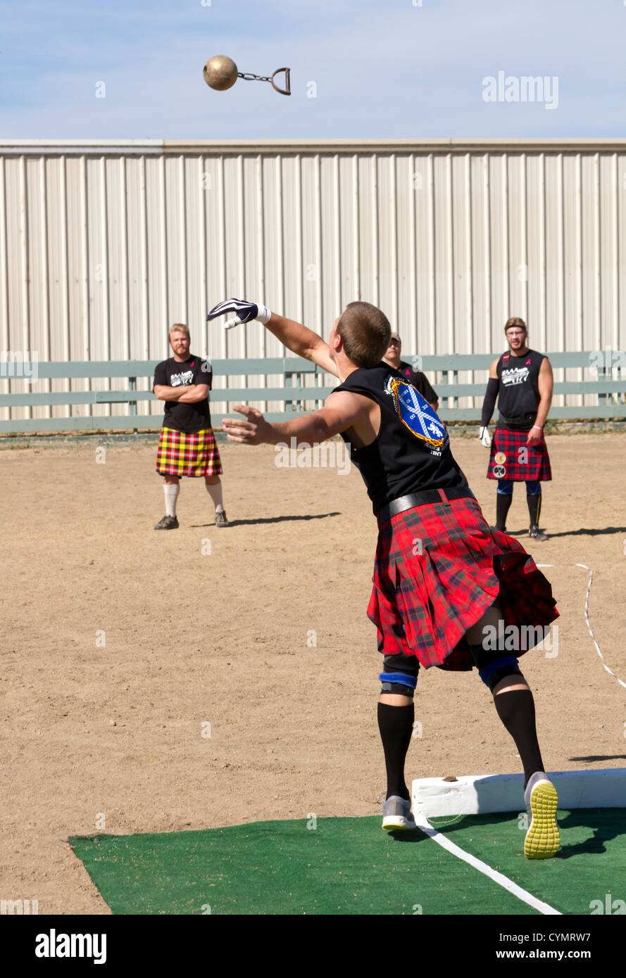 Athlete participating in the Highland Games "weight for distance" throw ...