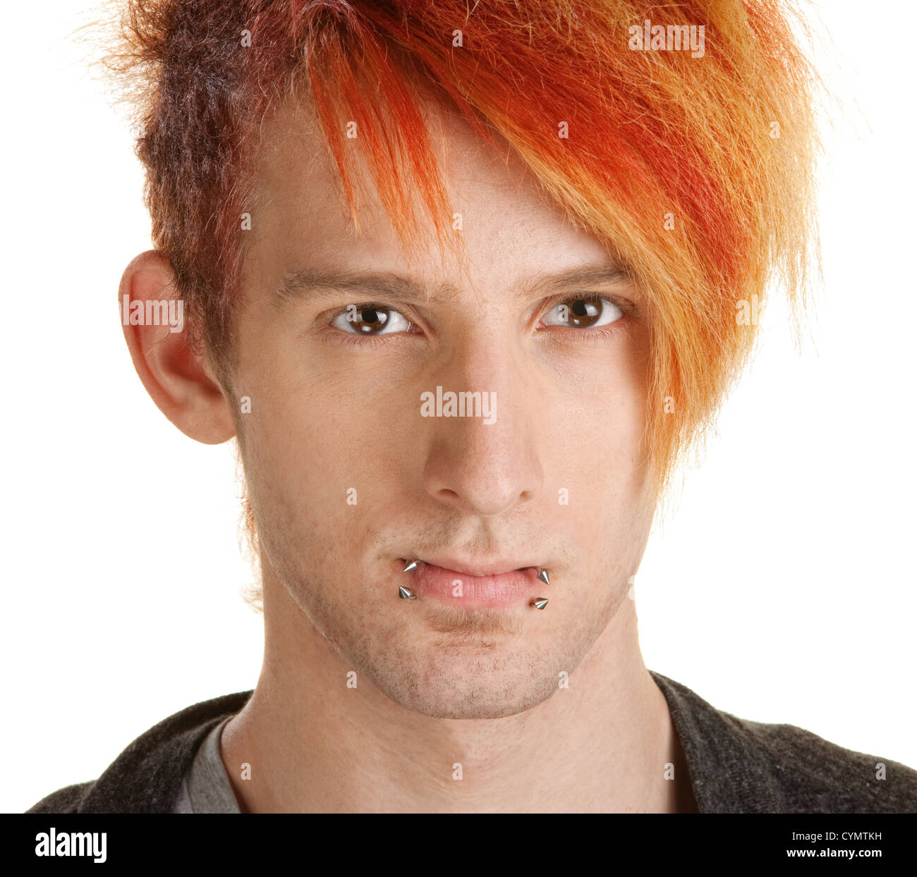 Young man with orange hair over white background Stock Photo - Alamy