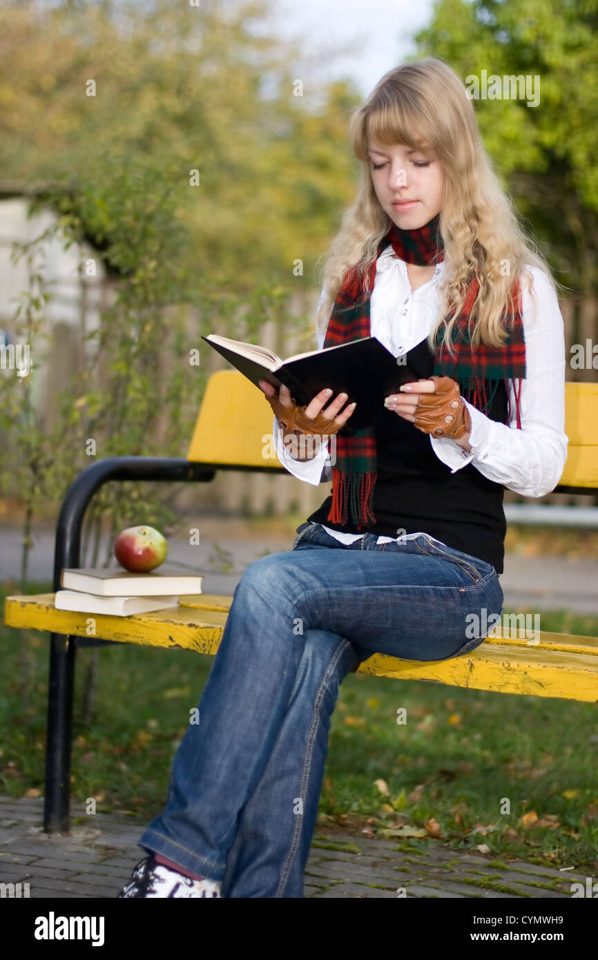 Student girl studying outside in the autumn Stock Photo - Alamy