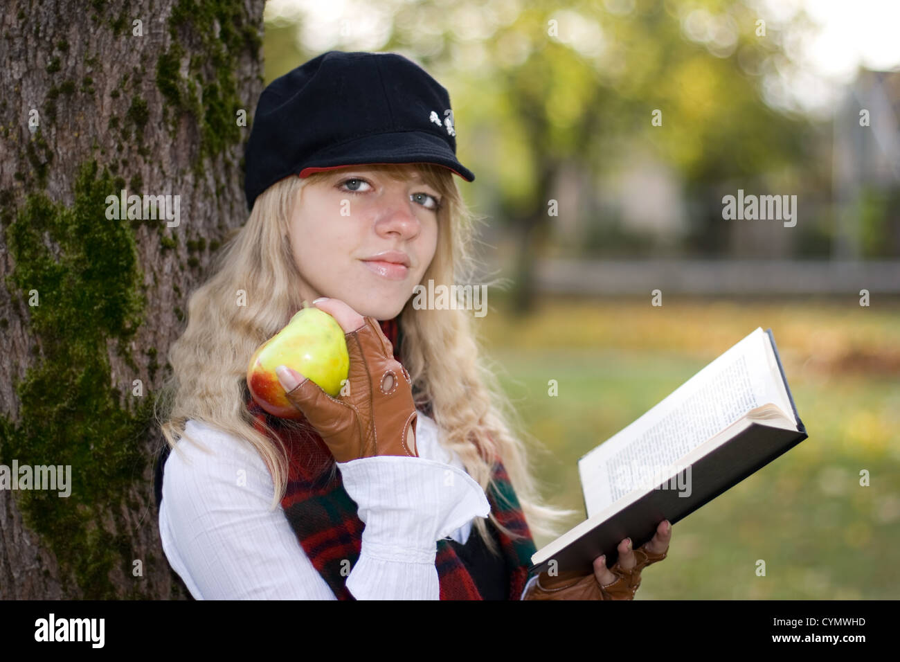 Student girl studying outside in the autumn Stock Photo - Alamy