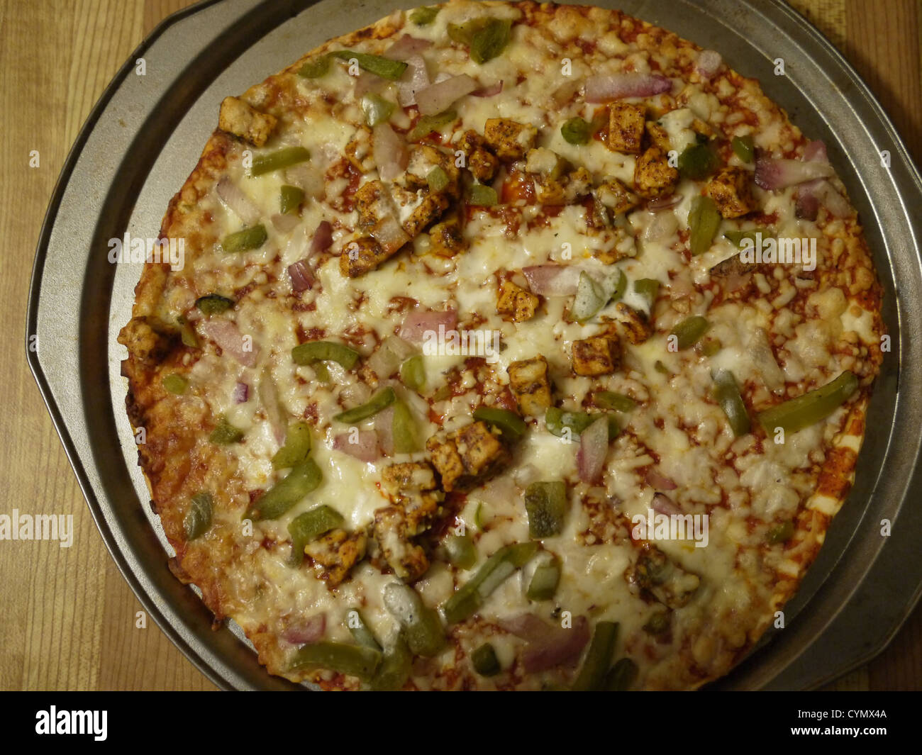 home baked frozen pizza Stock Photo - Alamy