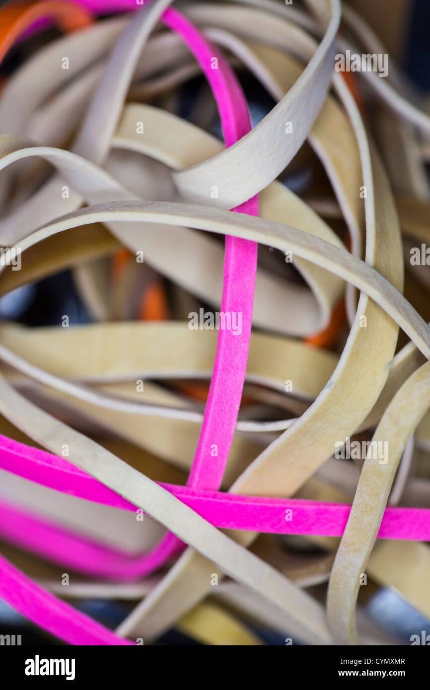 Closeup of pile of rubber bands Stock Photo - Alamy