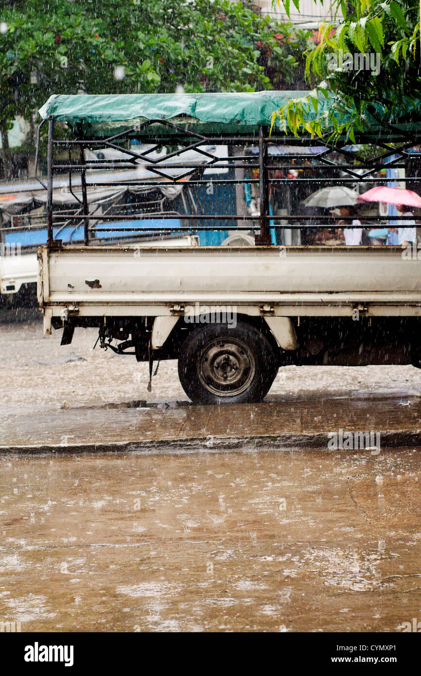 Streets of Yangon during heavy rain Stock Photo - Alamy