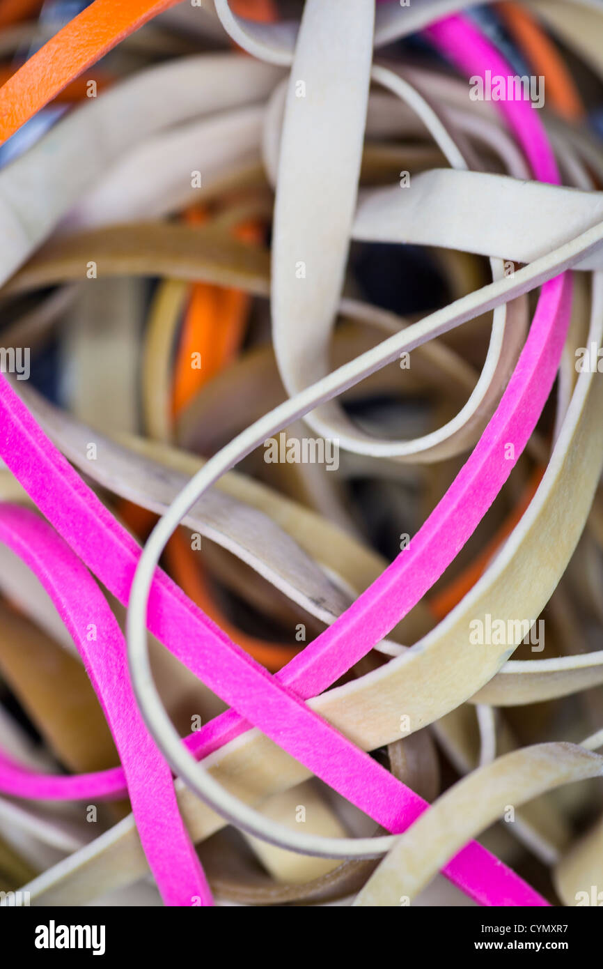 Closeup of pile of rubber bands Stock Photo - Alamy