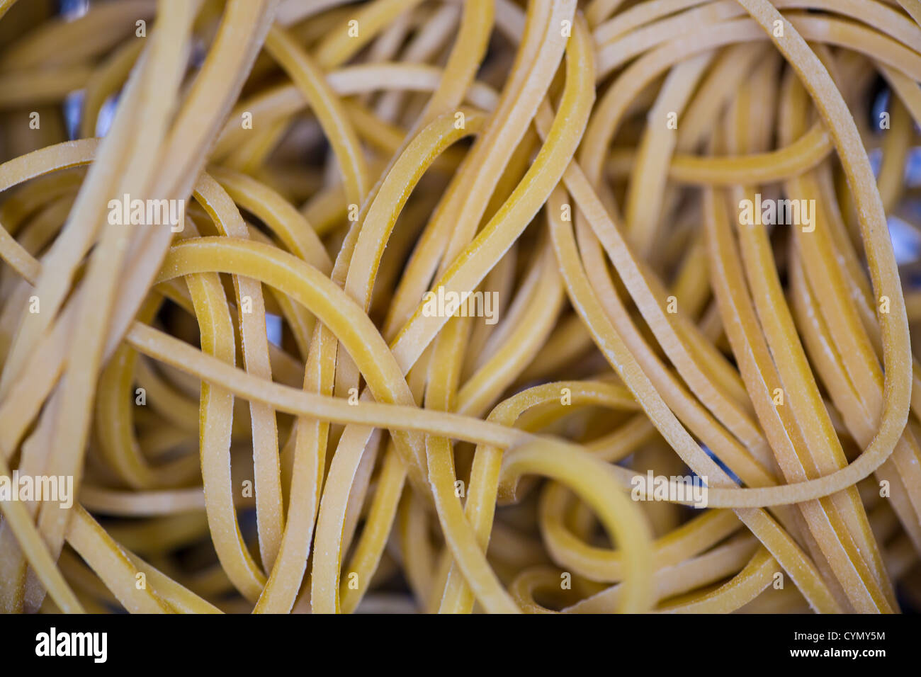 Closeup of pile of rubber bands Stock Photo - Alamy