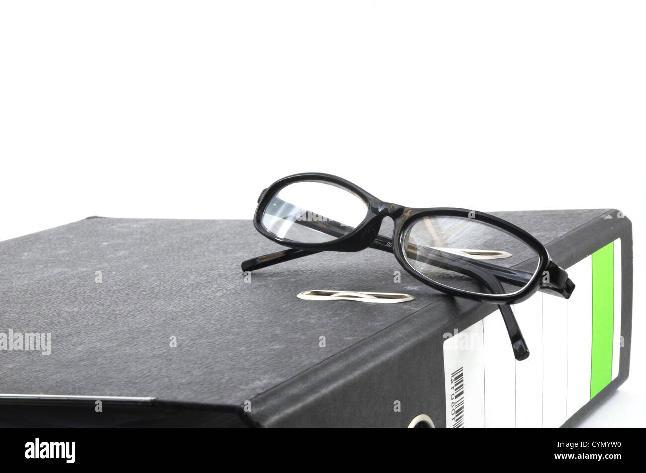 eye glasses and folder in the office showing paperwork concept Stock ...