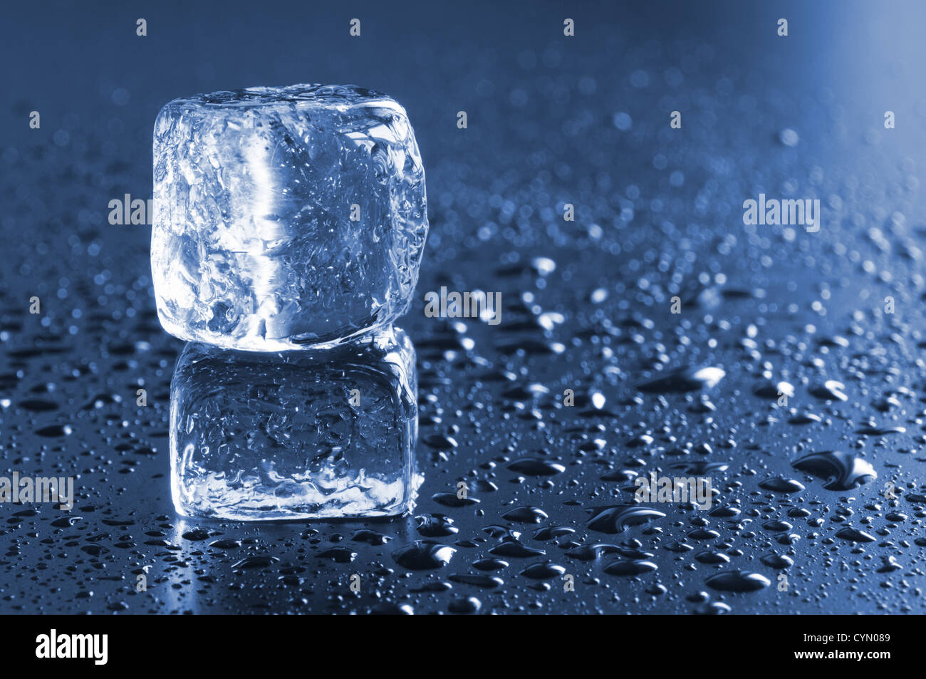 ice cube macro in blue with water drops Stock Photo - Alamy