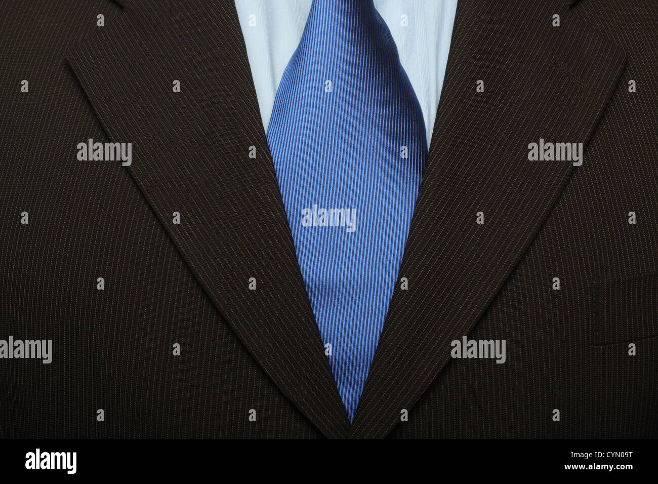 cropped shot of torso part of a man in black suit Stock Photo - Alamy