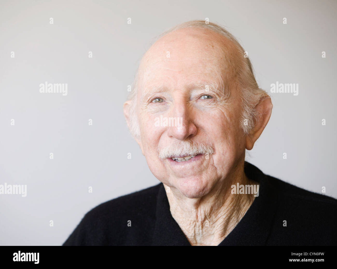 Portrait of a male senior citizen against a white background Stock ...