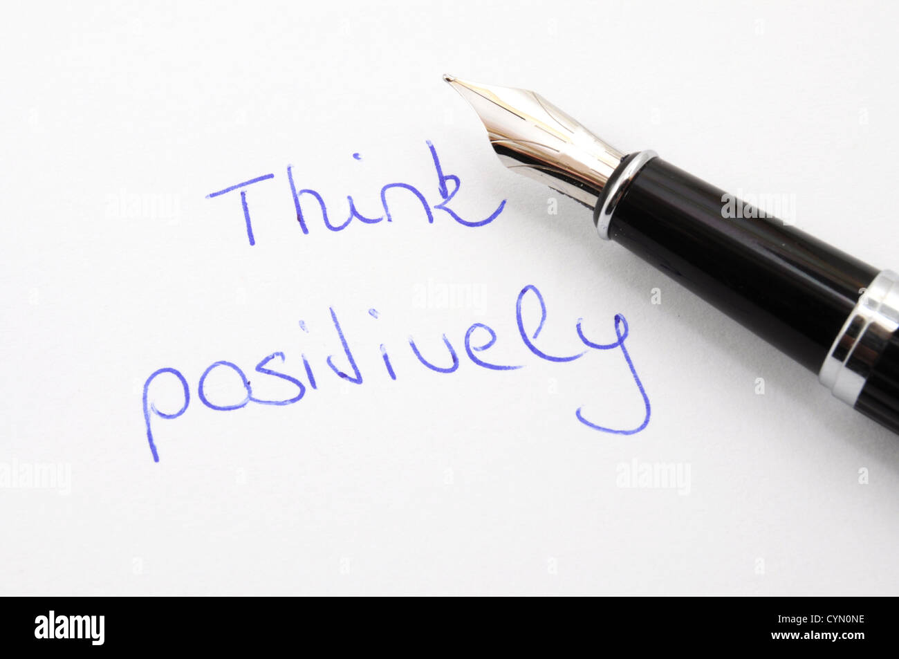think positive concept with pen and paper Stock Photo - Alamy