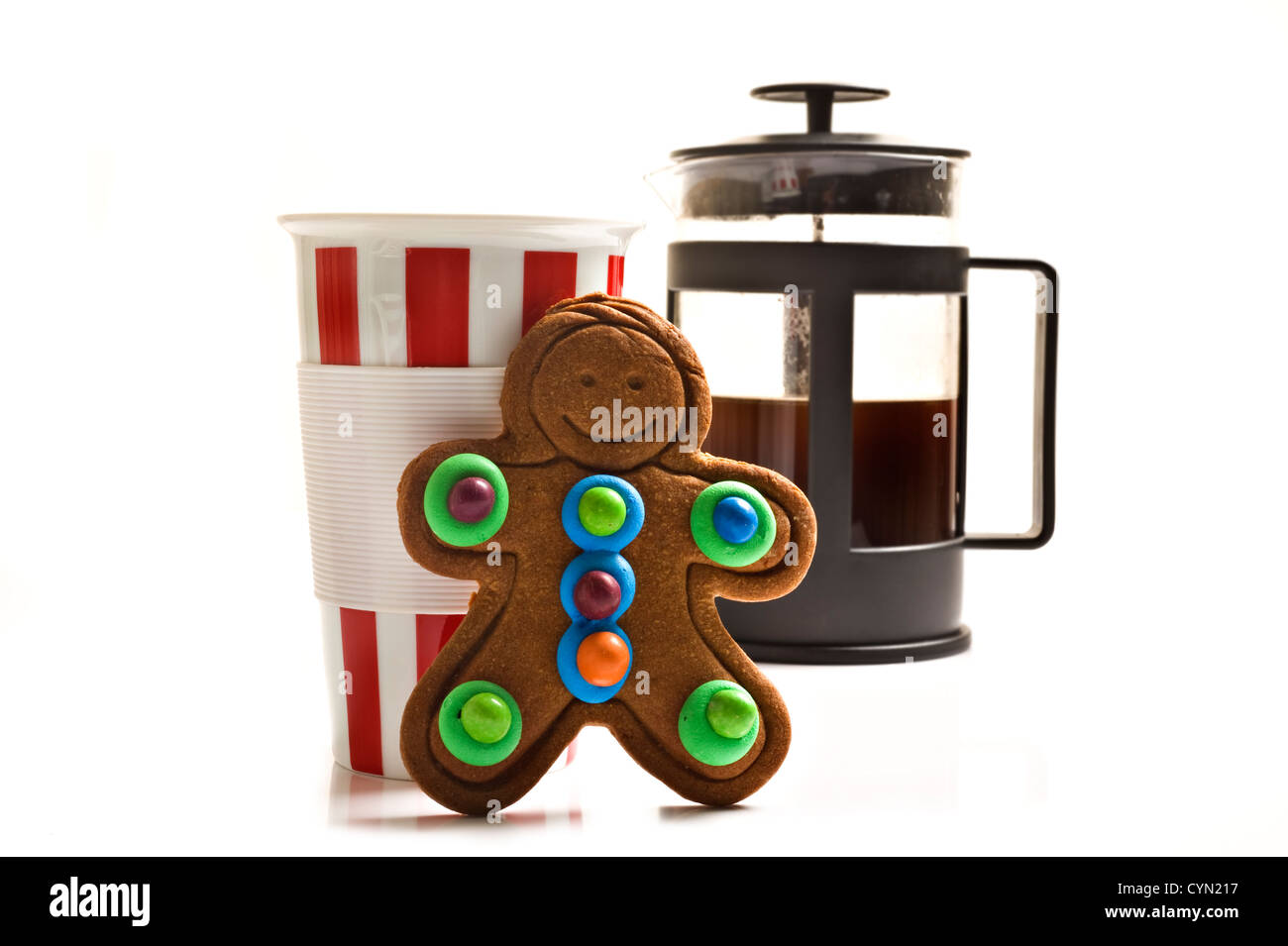 Colorful gingerbread man with a cup and plunger of coffee Stock Photo ...