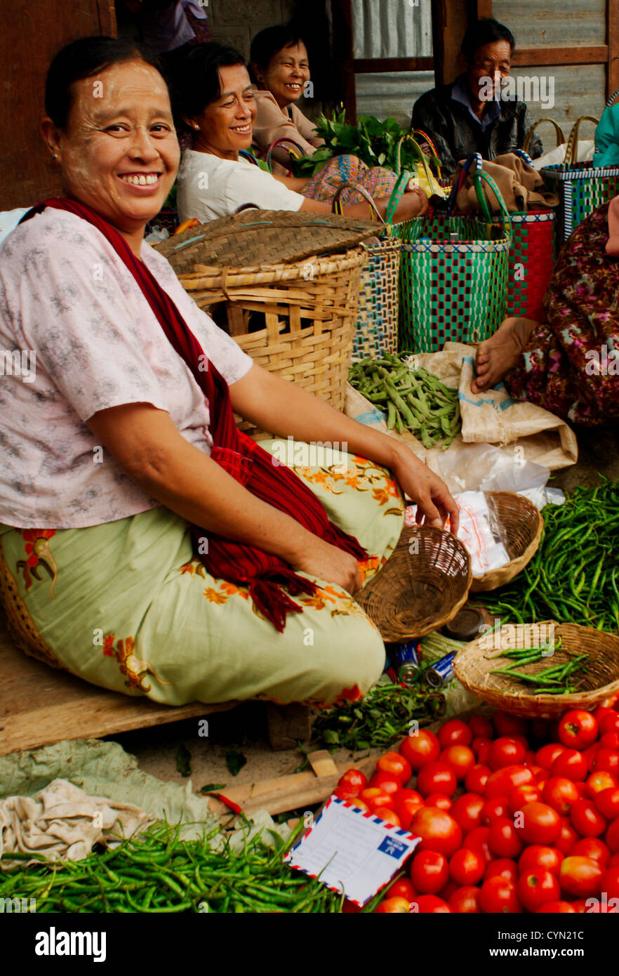 Women selling goods at market at Inle region Stock Photo - Alamy