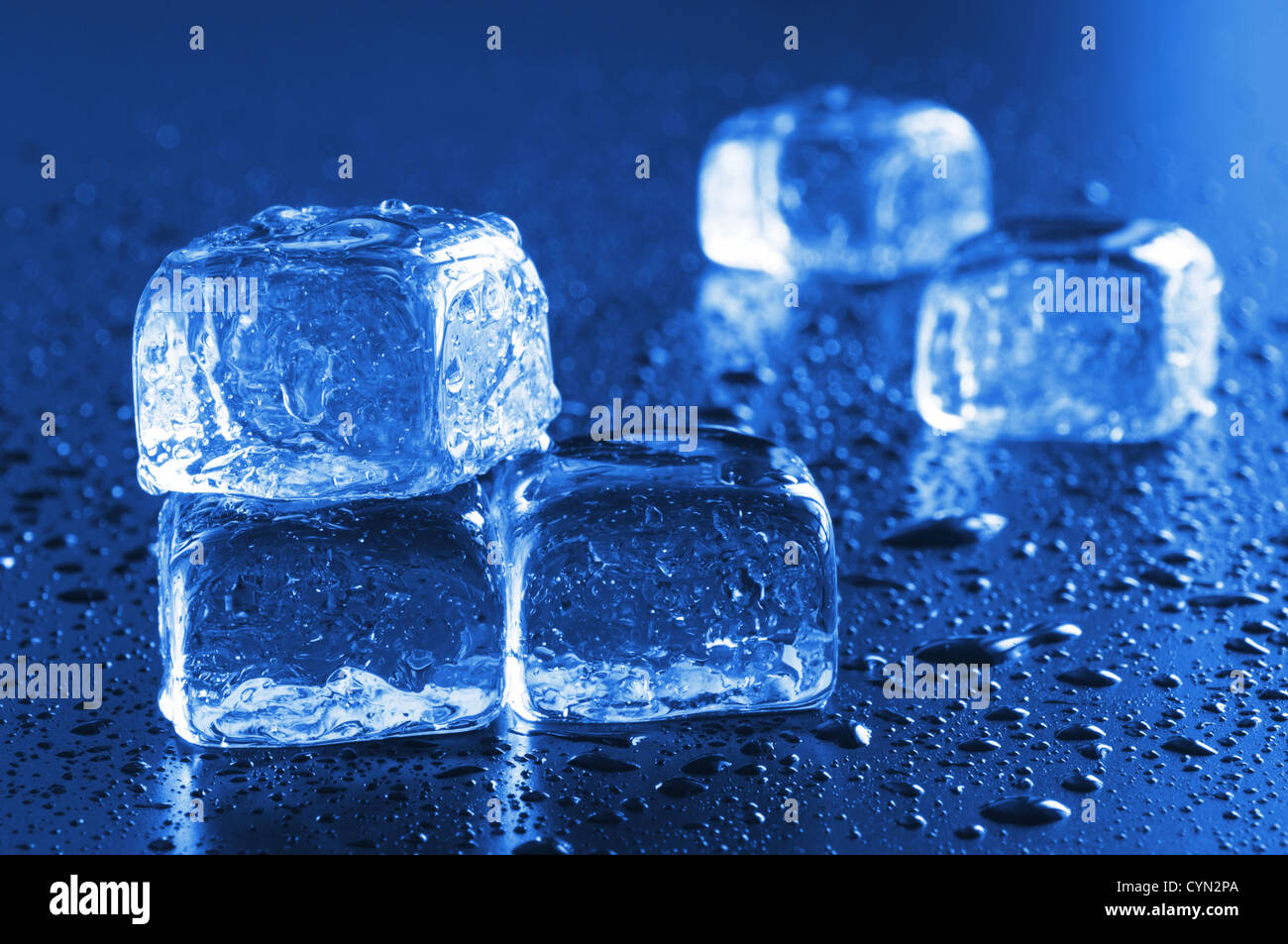 ice cube macro in blue with water drops Stock Photo - Alamy