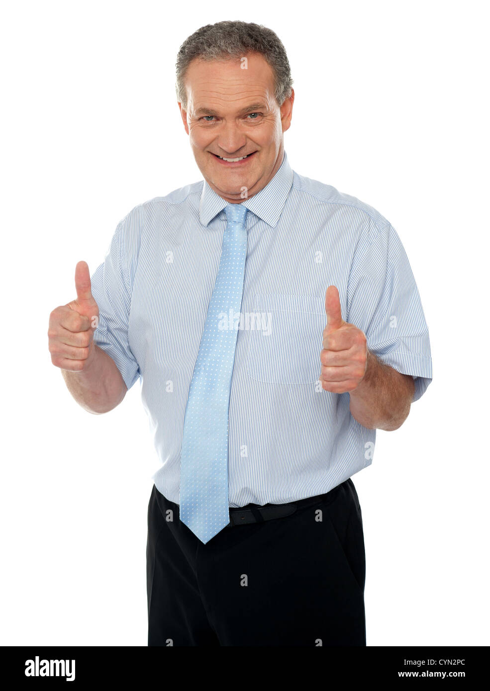 Cheerful senior executive standing with double thumbs up in front of ...