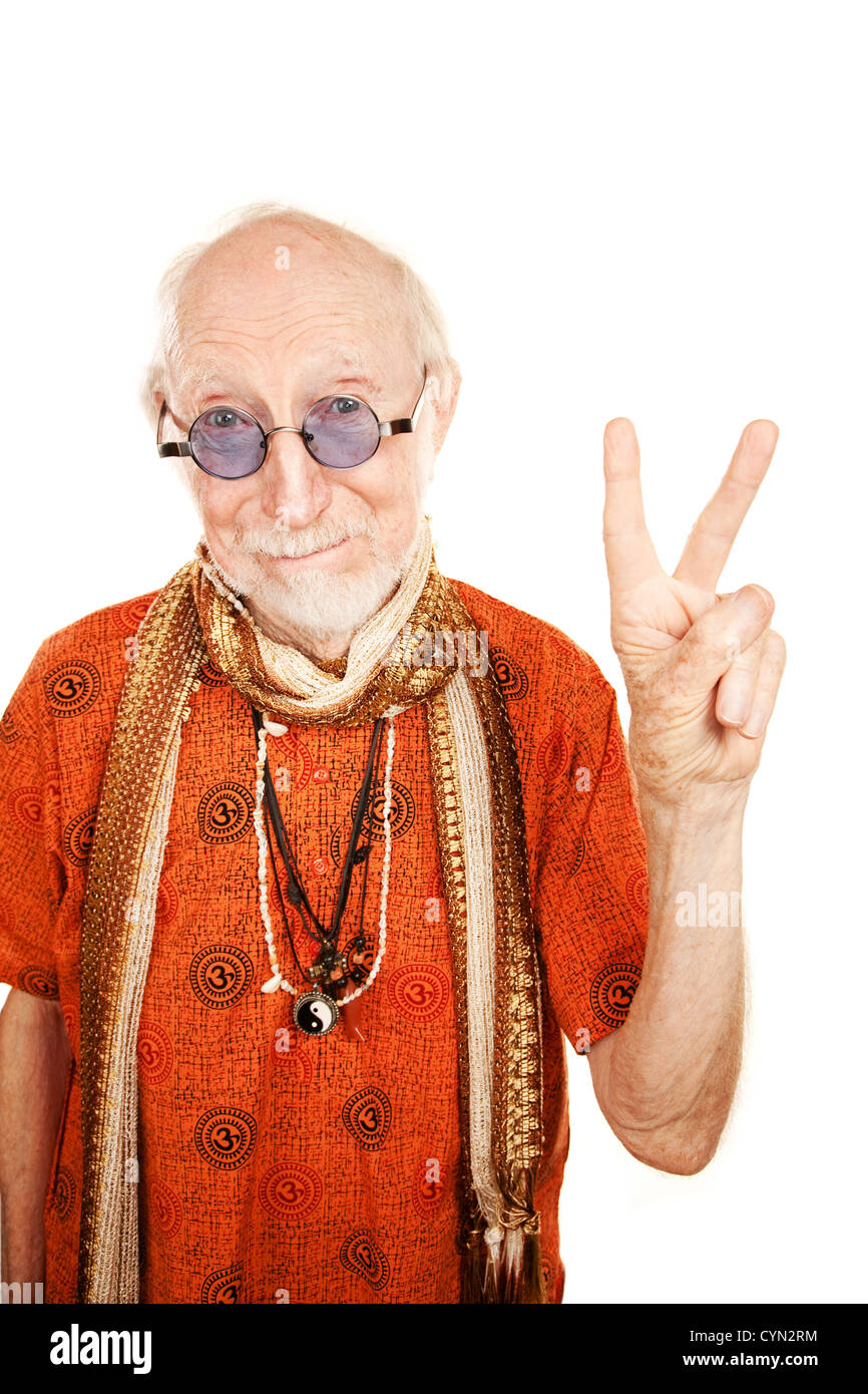 New age senior man in orange shirt making peace sign Stock Photo - Alamy