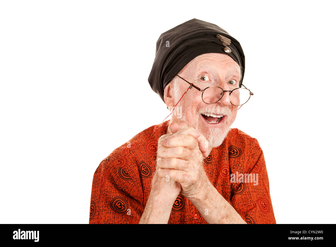 Happy senior guru with his hands clasped Stock Photo - Alamy