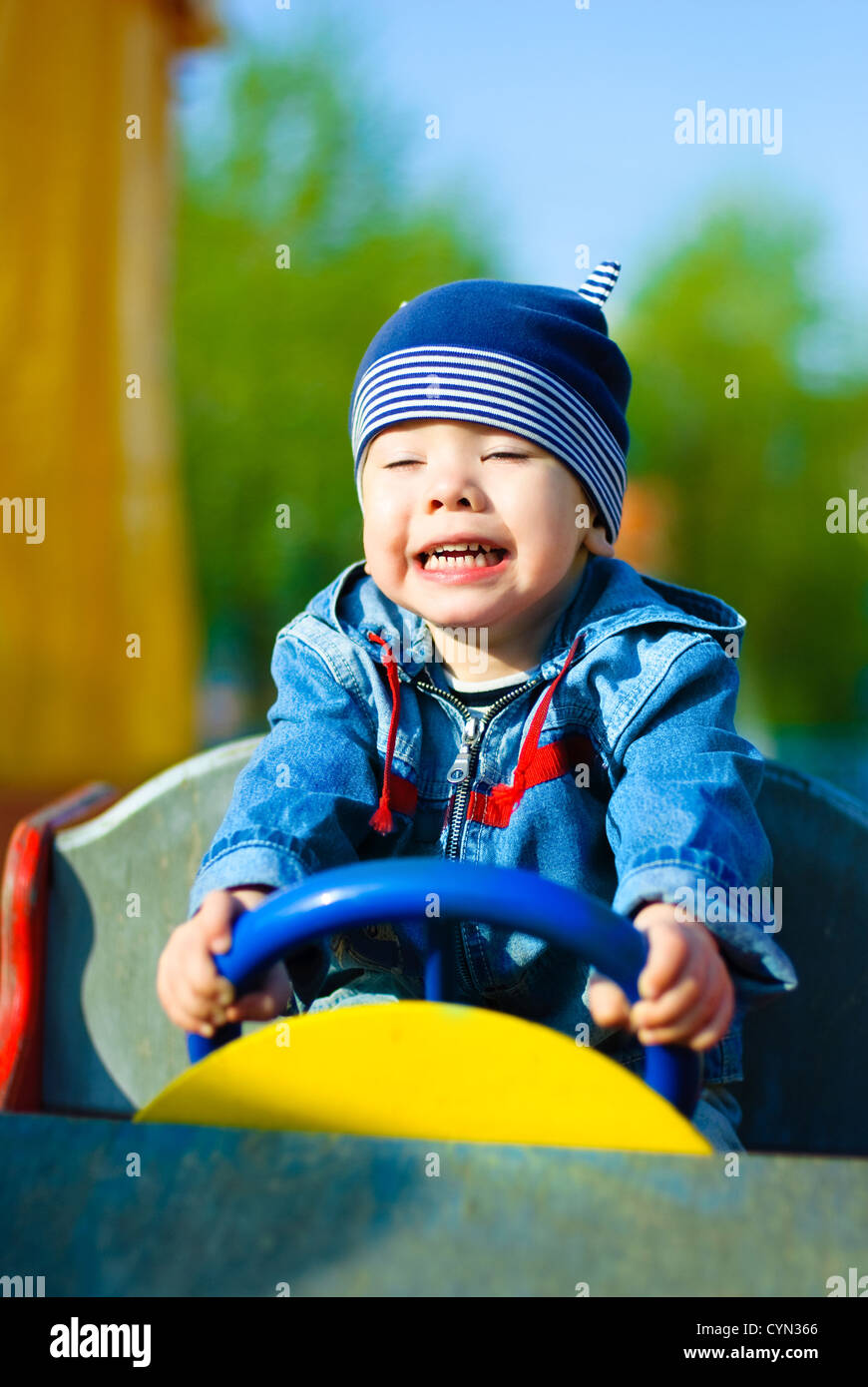 Child driving in a toy car hi-res stock photography and images - Alamy