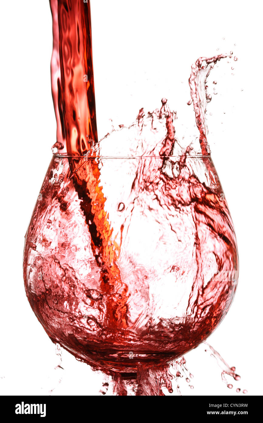 Wine splashing in glass Stock Photo - Alamy