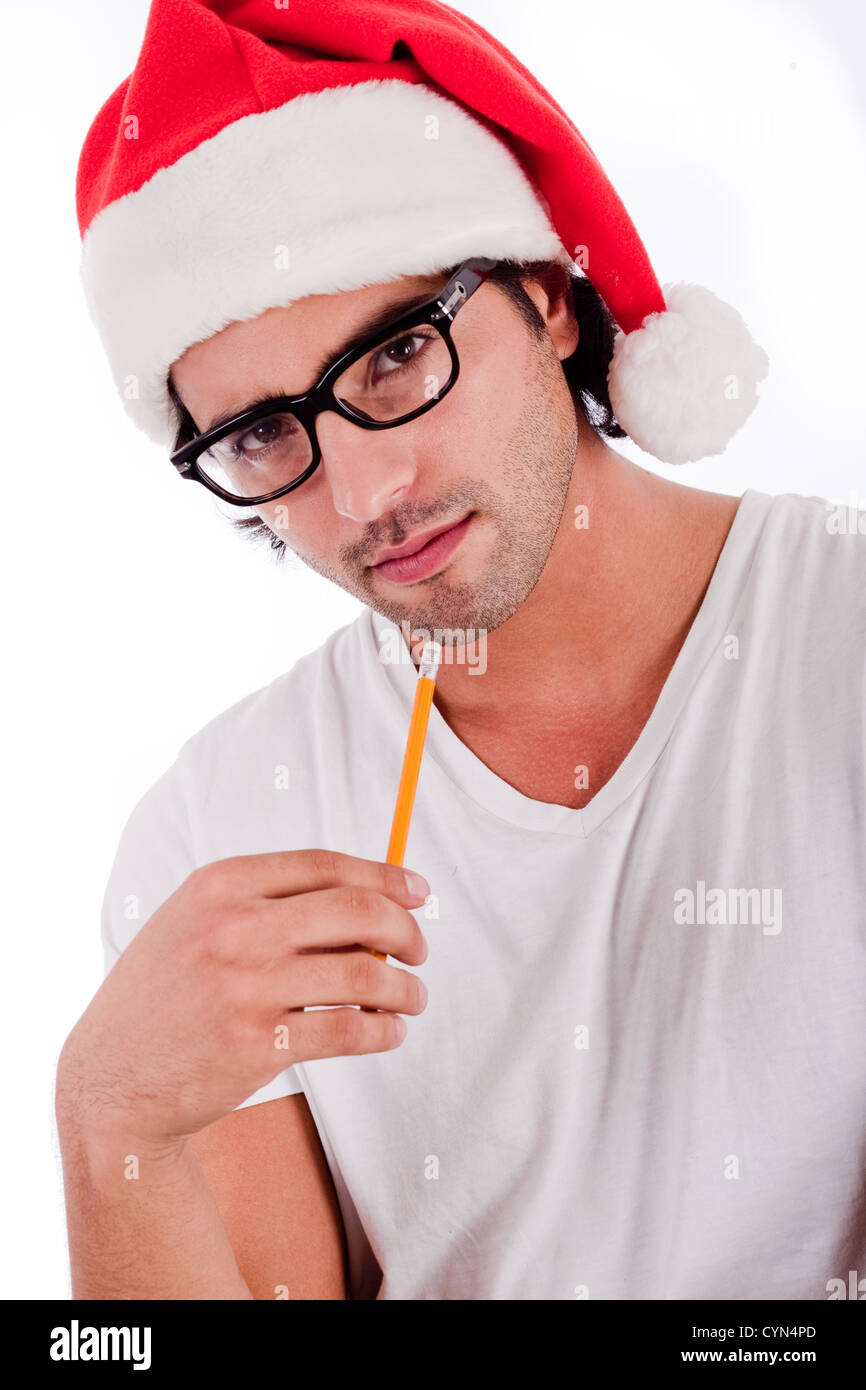 handsome man thinking by wearing santa's hat isolated on white ...