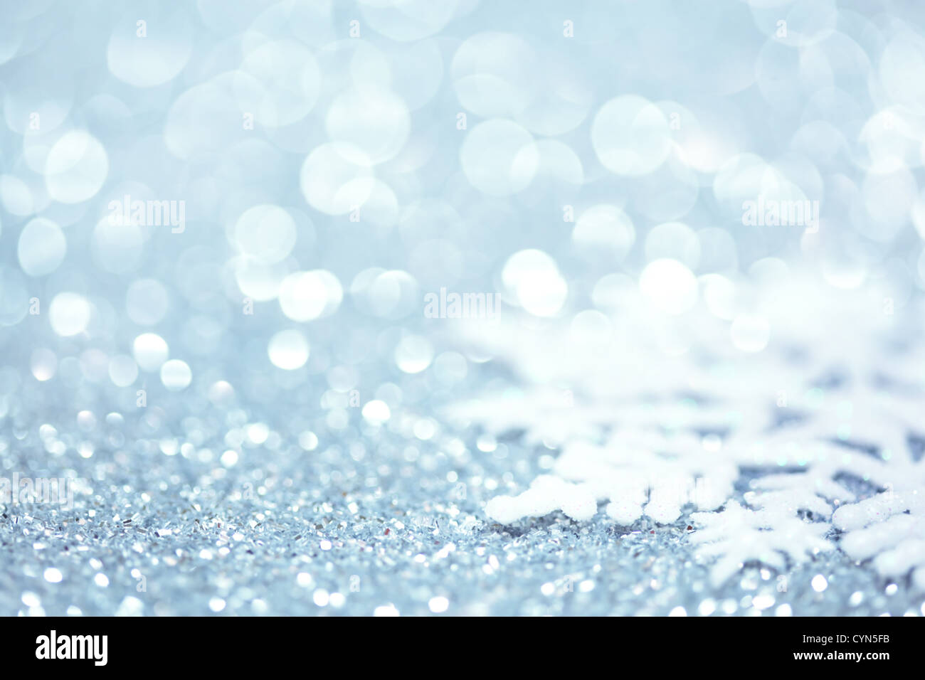 Snowflake on glitter Stock Photo - Alamy