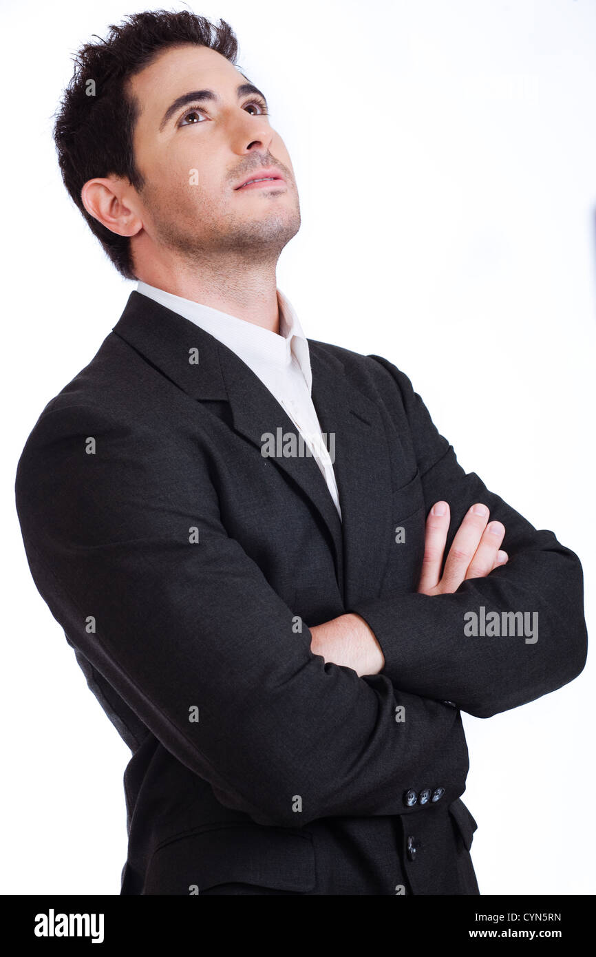 Handsome young man looking up,indoor studio Stock Photo - Alamy