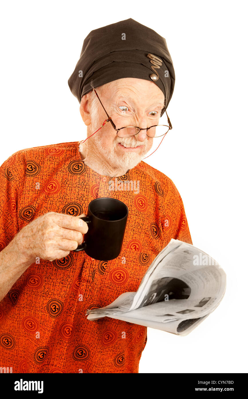 Skeptical New Age Man with Newspaper and Coffee Stock Photo - Alamy