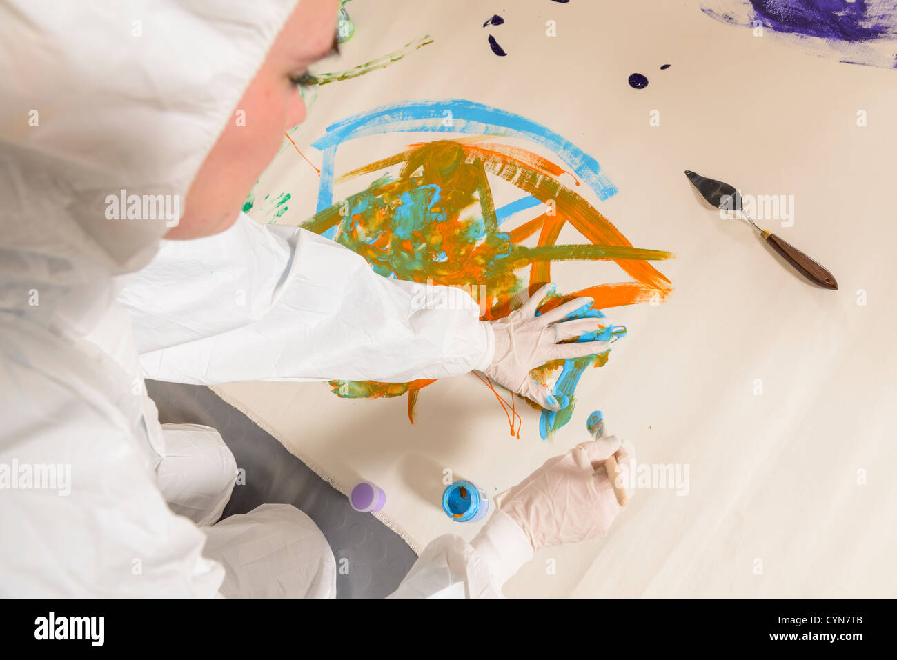 People having fun during art therapy session drawing paint Stock Photo ...