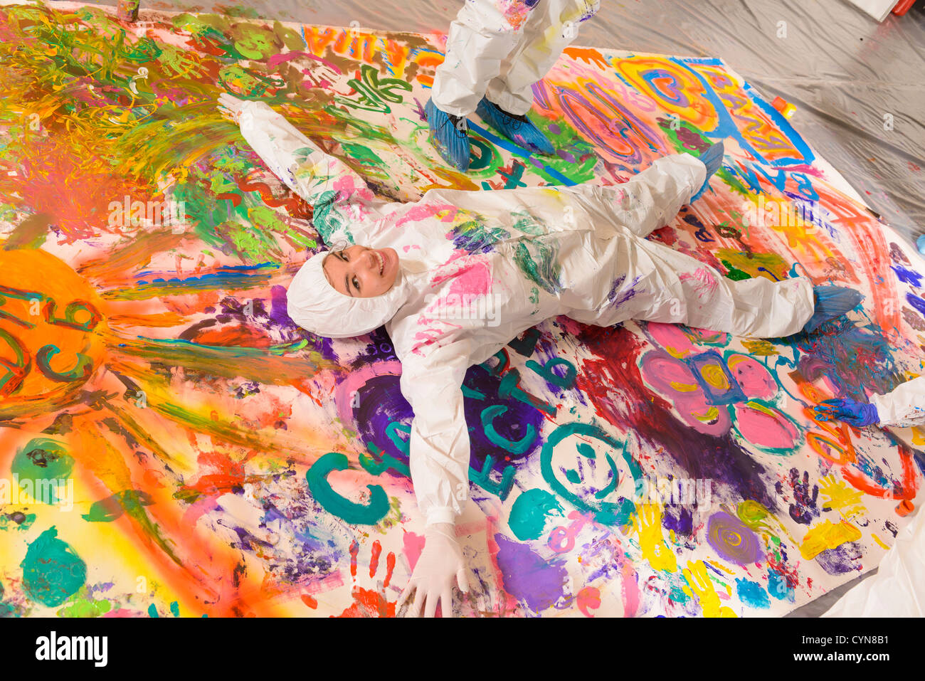 People having fun during art therapy session drawing paint Stock Photo ...