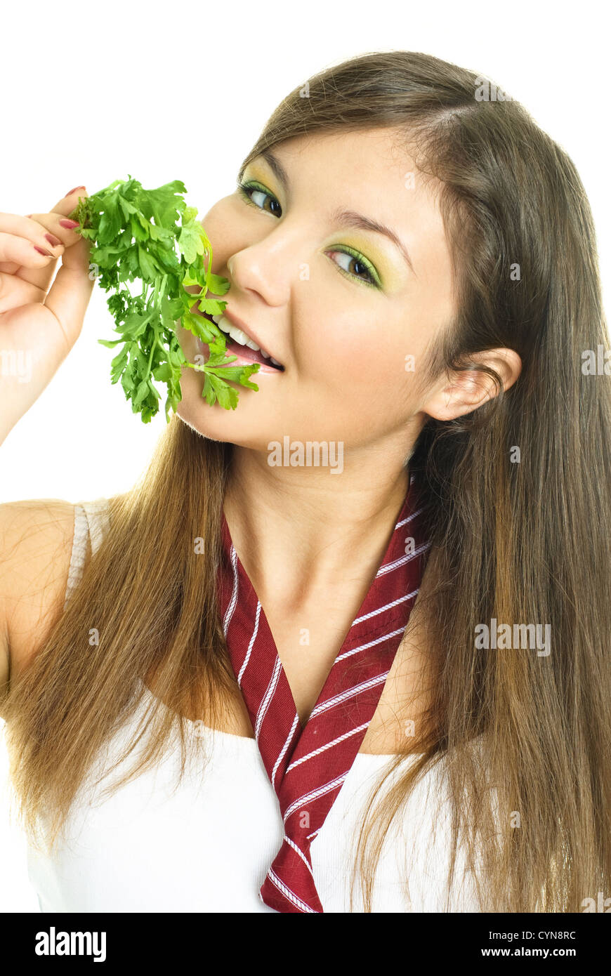 pretty girl eating parsley Stock Photo - Alamy