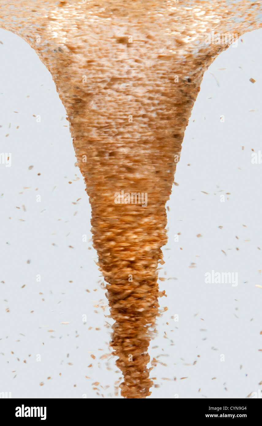 Side view of a tornado vortex swirl with wood chip debris, isolated ...