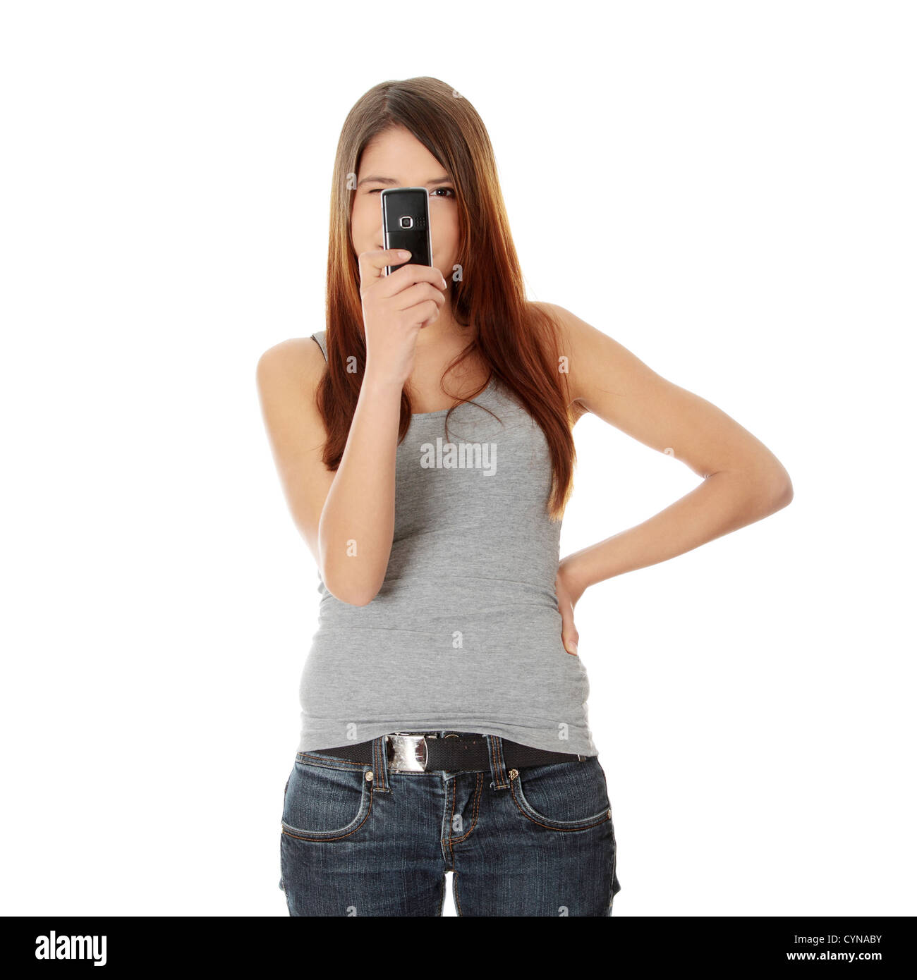 Teen girl using cell phone, isolated on white Stock Photo - Alamy