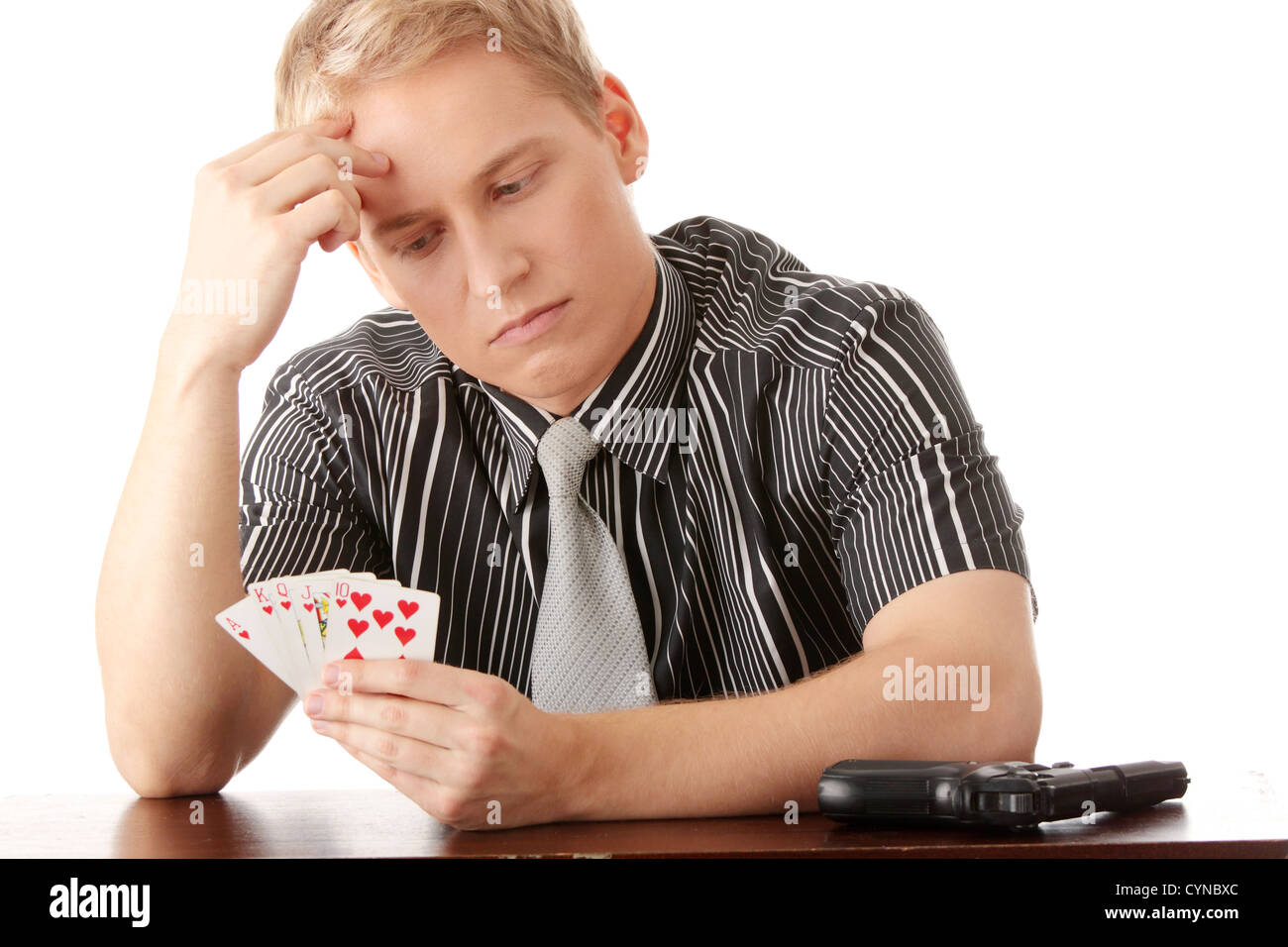 Young poker player with gun isolated on white Stock Photo - Alamy
