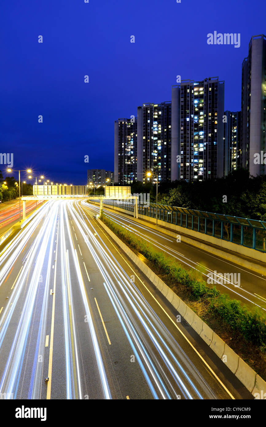 traffic with blur light through city at night Stock Photo - Alamy