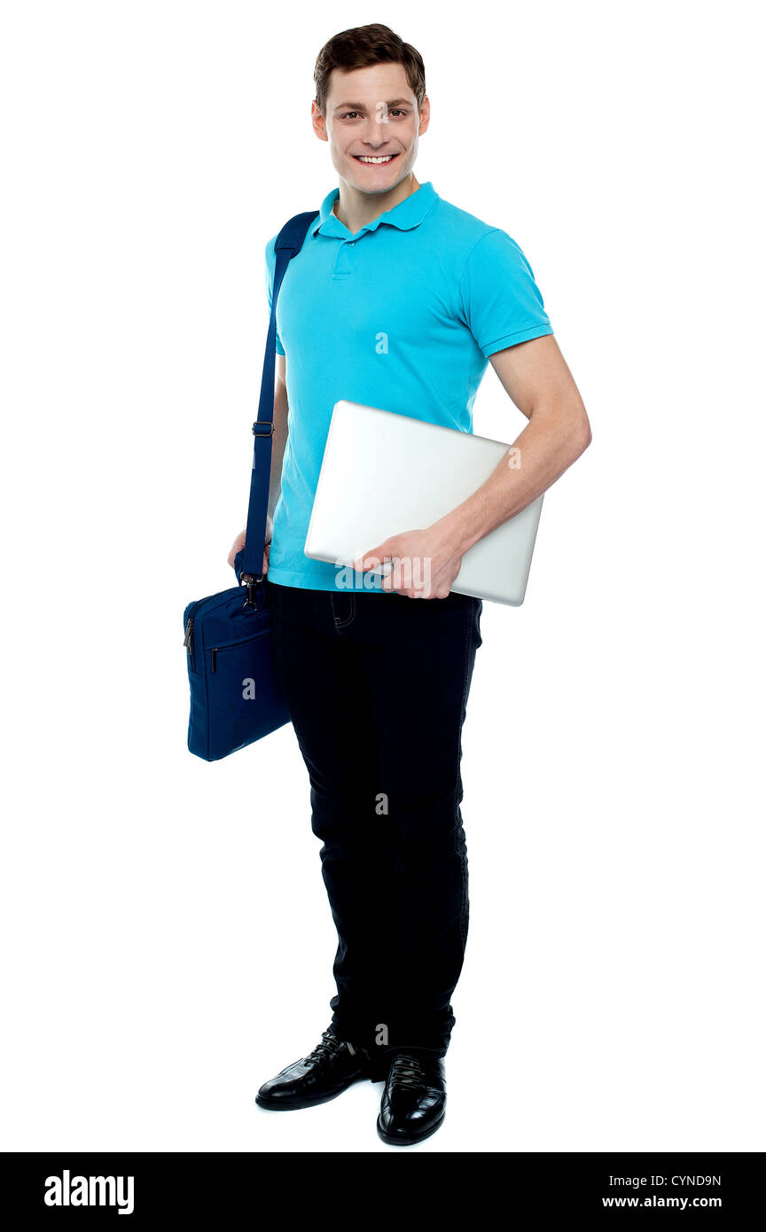 Full length portrait of cheerful man carrying laptop, off to work Stock ...