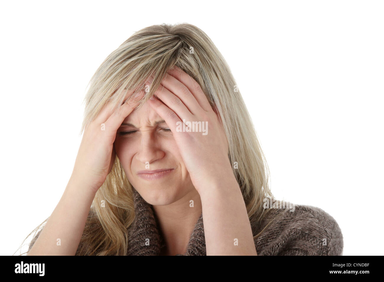 Woman with headache holding her hand to the head, isolated on white ...