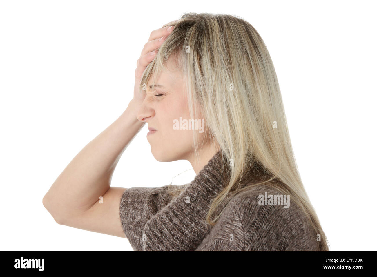 Woman with headache holding her hand to the head Stock Photo - Alamy