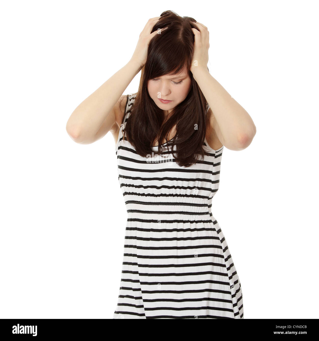 Woman with headache holding her hand to the head, isolated on white ...