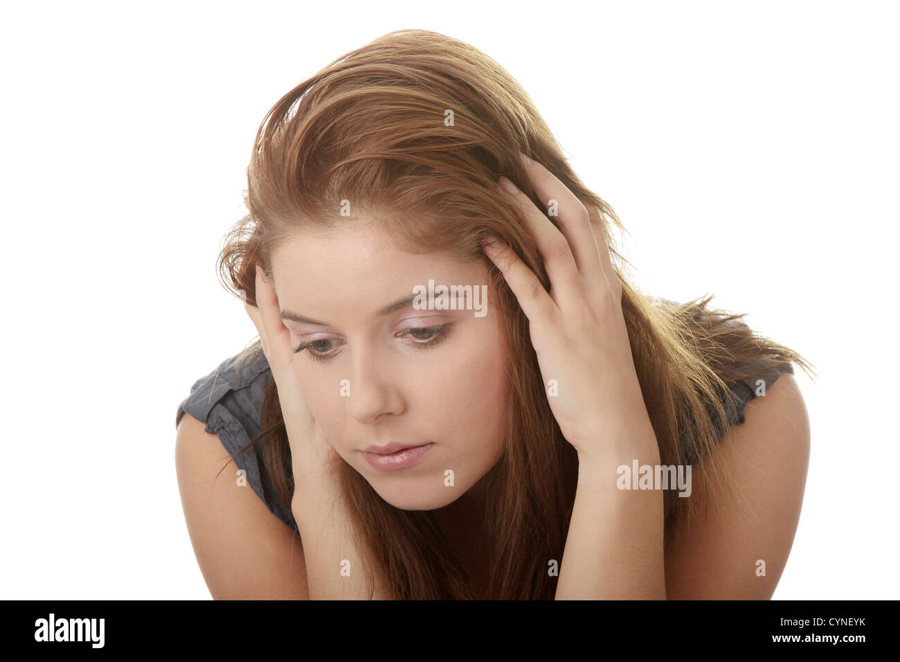 A worried and afraid young woman sitting on chair. Isolated Stock Photo ...