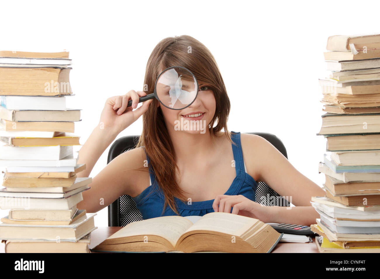 Teen girl learning at the desk Stock Photo - Alamy
