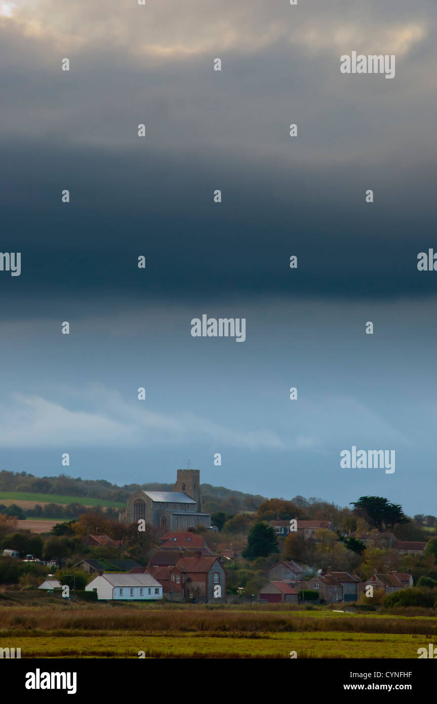 Salthouse village across marsh on winter aftreenoon Stock Photo - Alamy