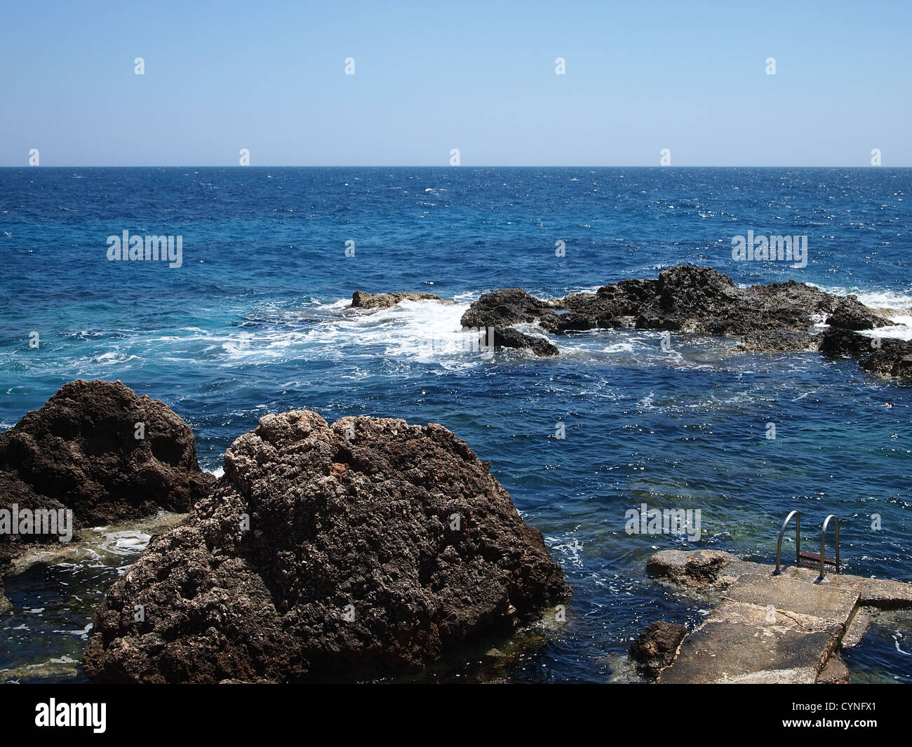 Lots of rocks in a sea Stock Photo - Alamy