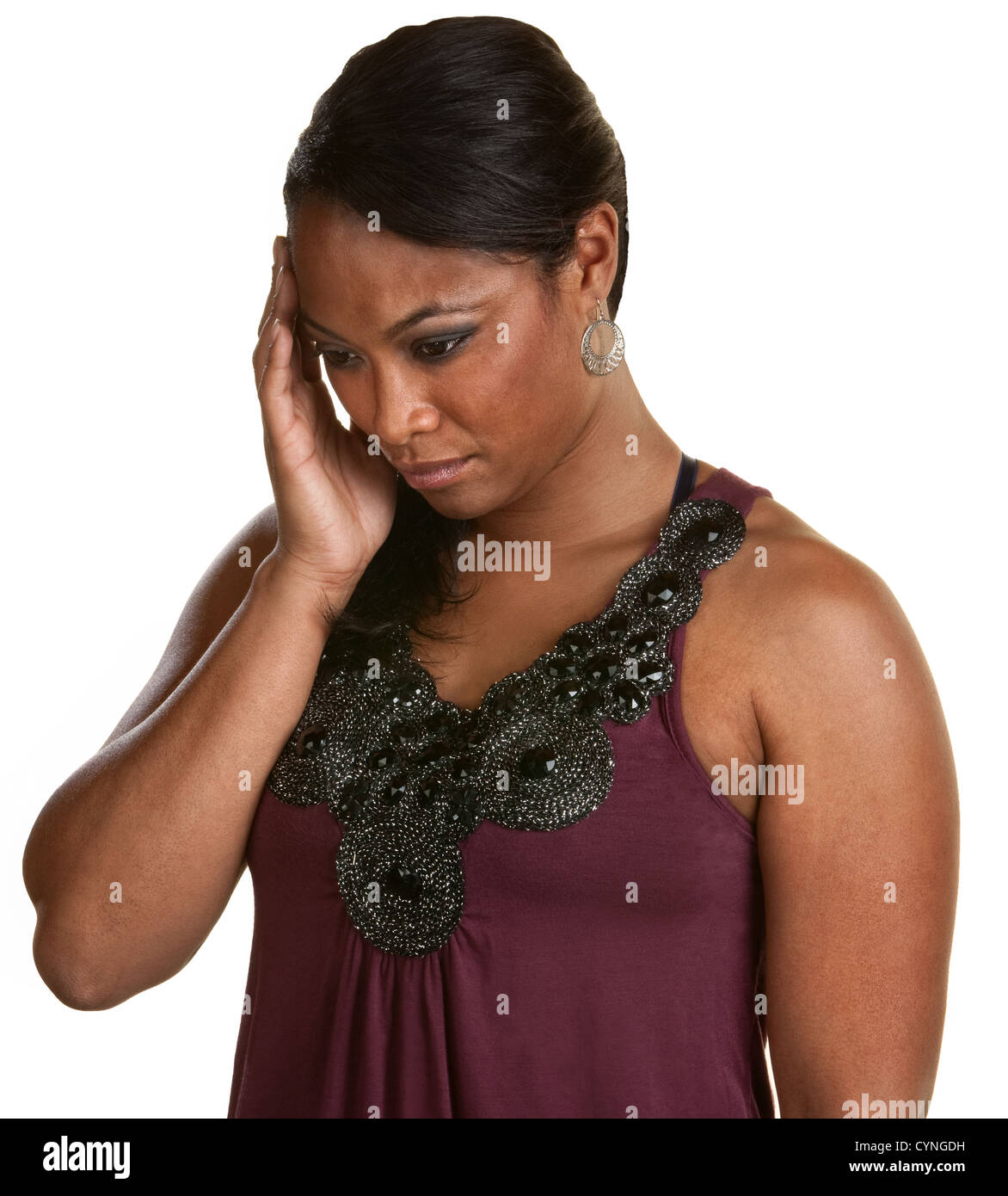 Black woman with hand on head looking down Stock Photo - Alamy