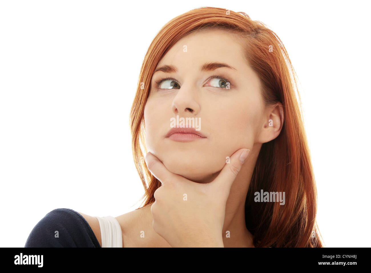 Thoughtful business woman looking right, isolated over a white ...